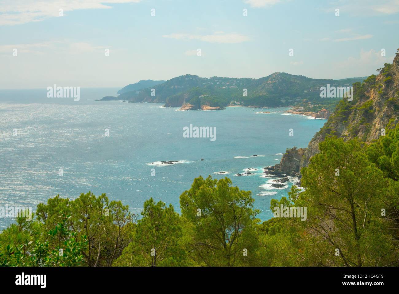 View of beautiful colorful coastline with cliffs, mountains and crystal ...