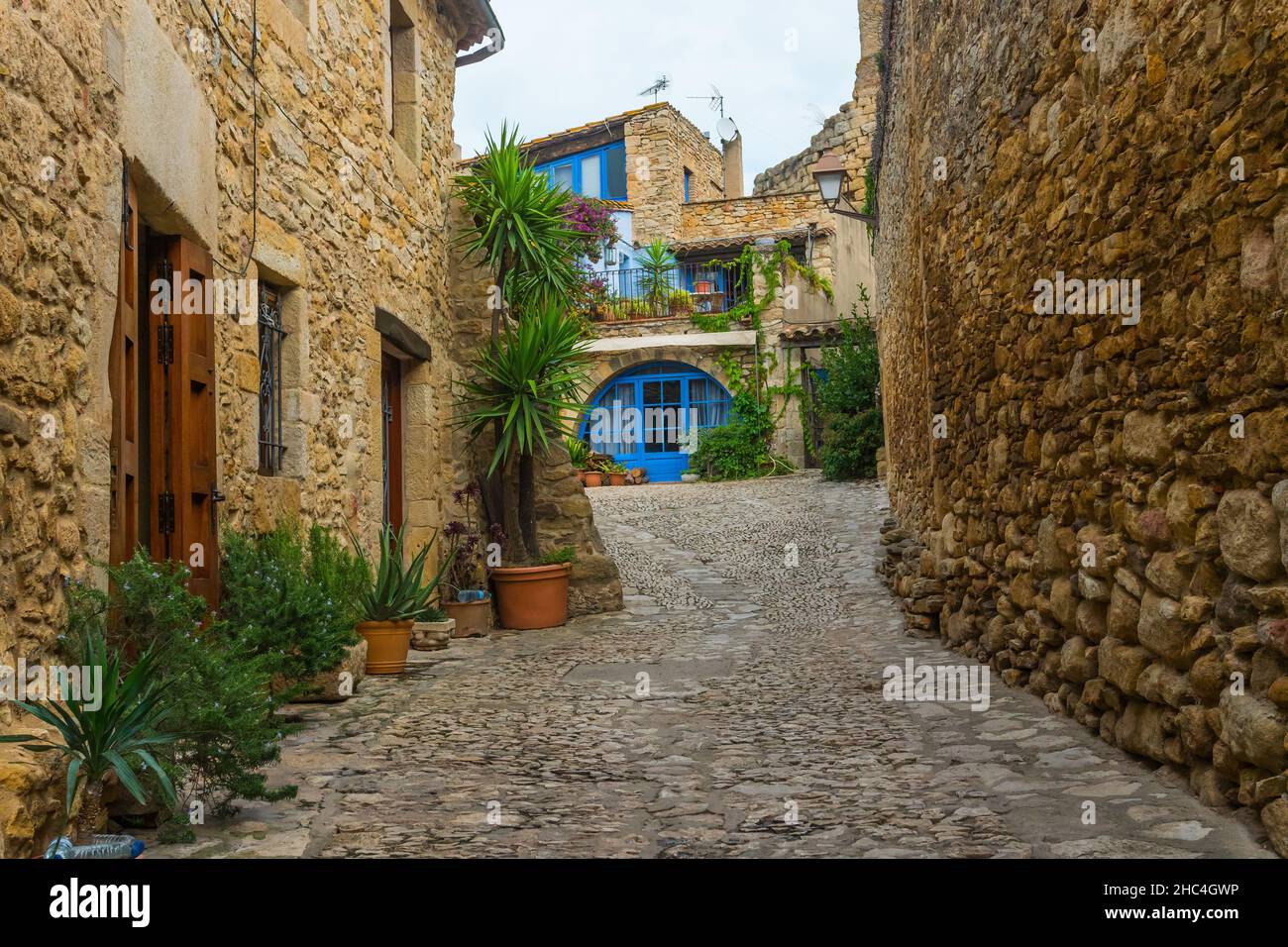 Beautiful colorful medieval street and terrace with plants Stock Photo ...