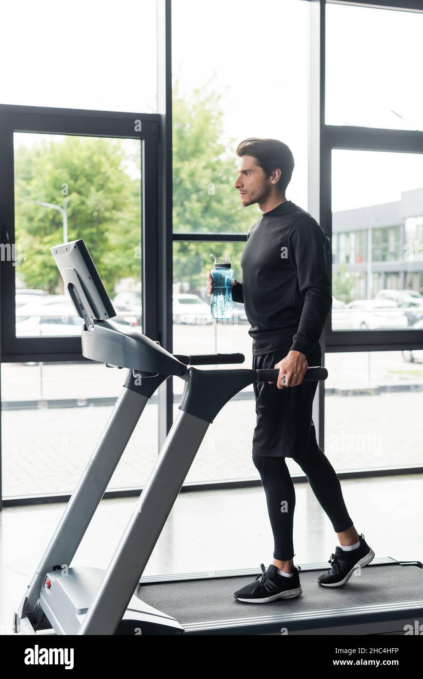 Person on treadmill side profile view hi-res stock photography and ...