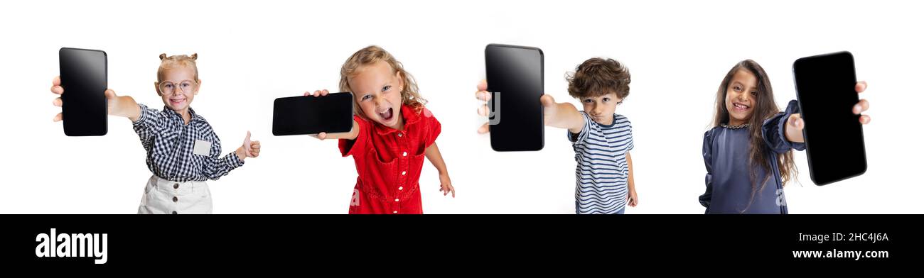Collage of beautiful smiling children showing phone screen isolated ...