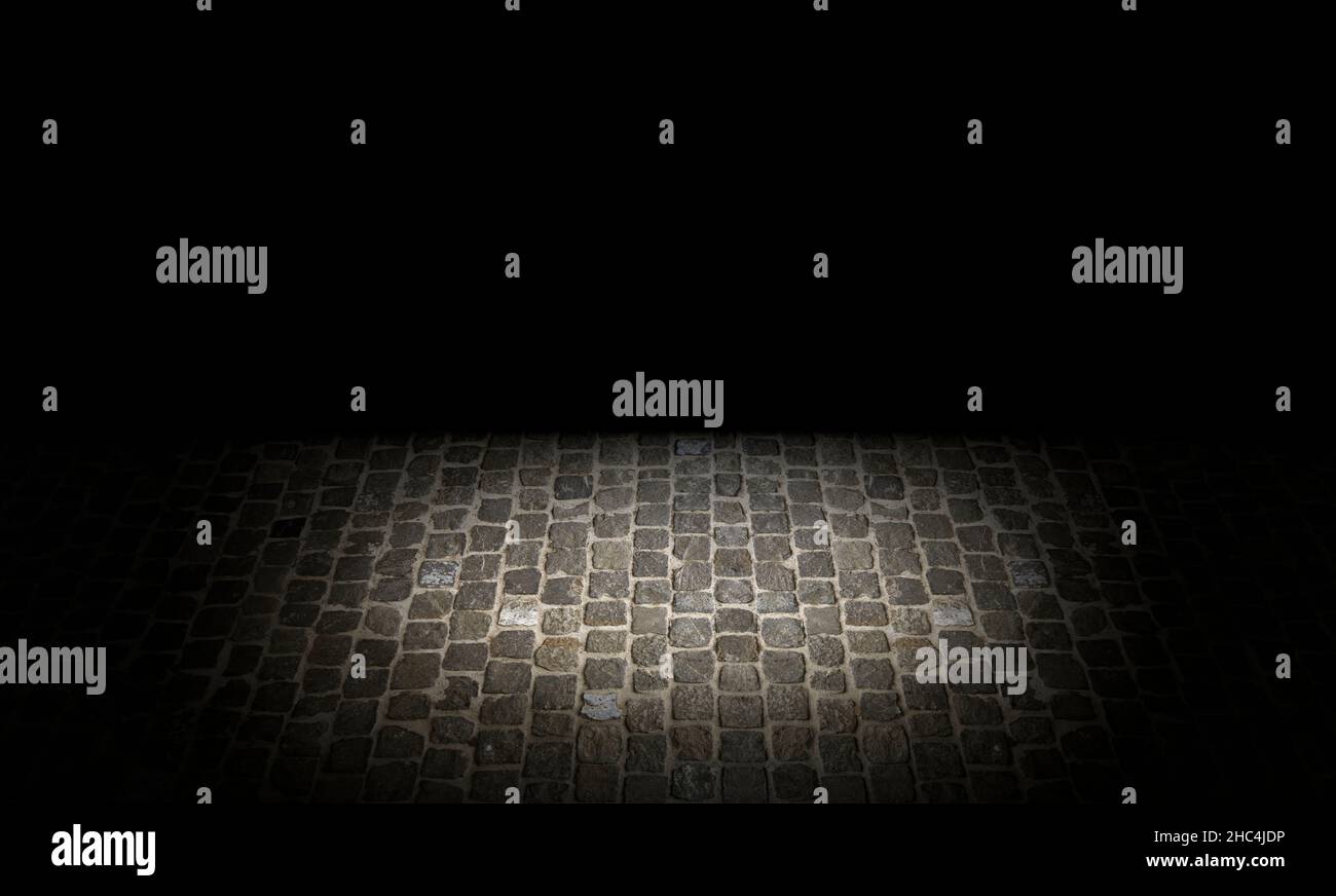 Shot of a cobblestone structure on the ground of an urban street in ...