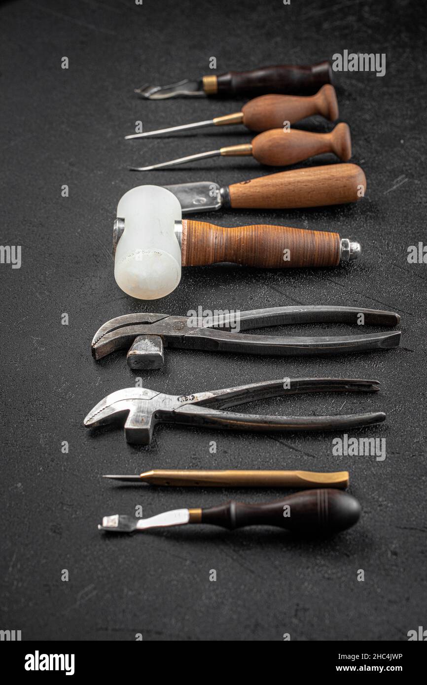 Set of leather craft cobbler tools Stock Photo - Alamy