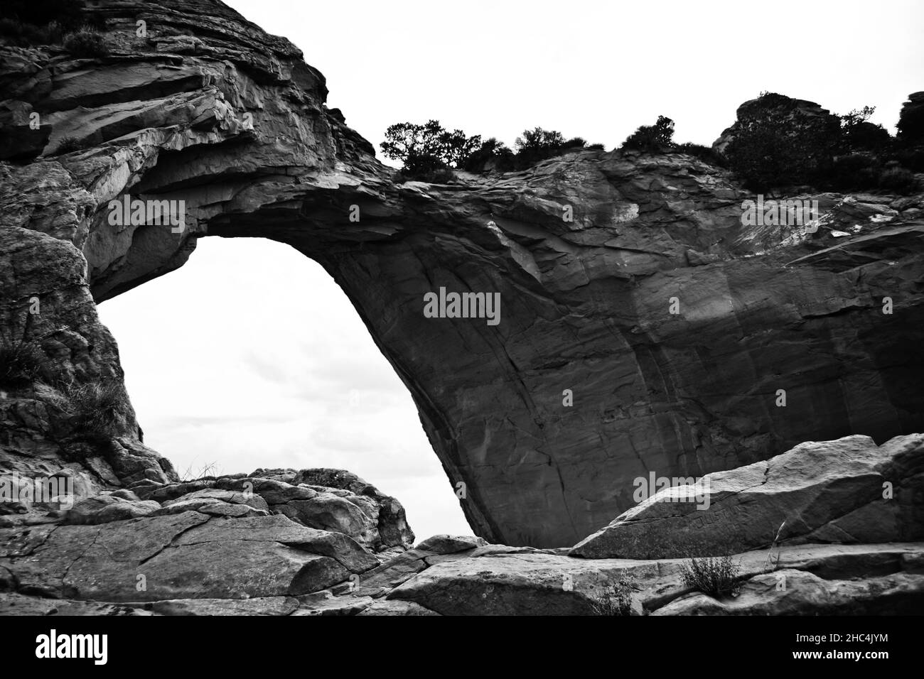 Clouds roll by in the sky behind the majesty of Window Rock, Window ...