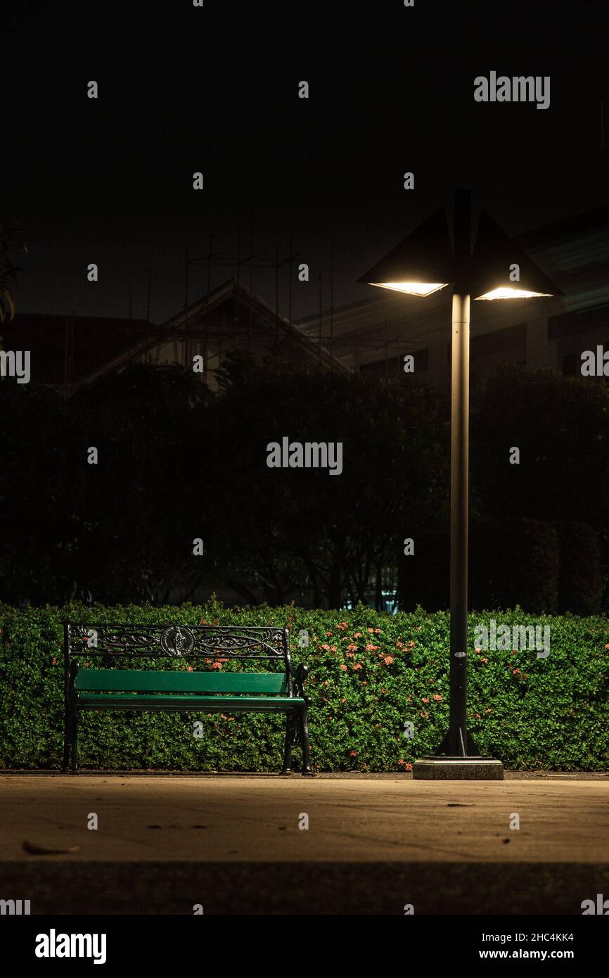 A bench under the street lamp hi-res stock photography and images - Alamy