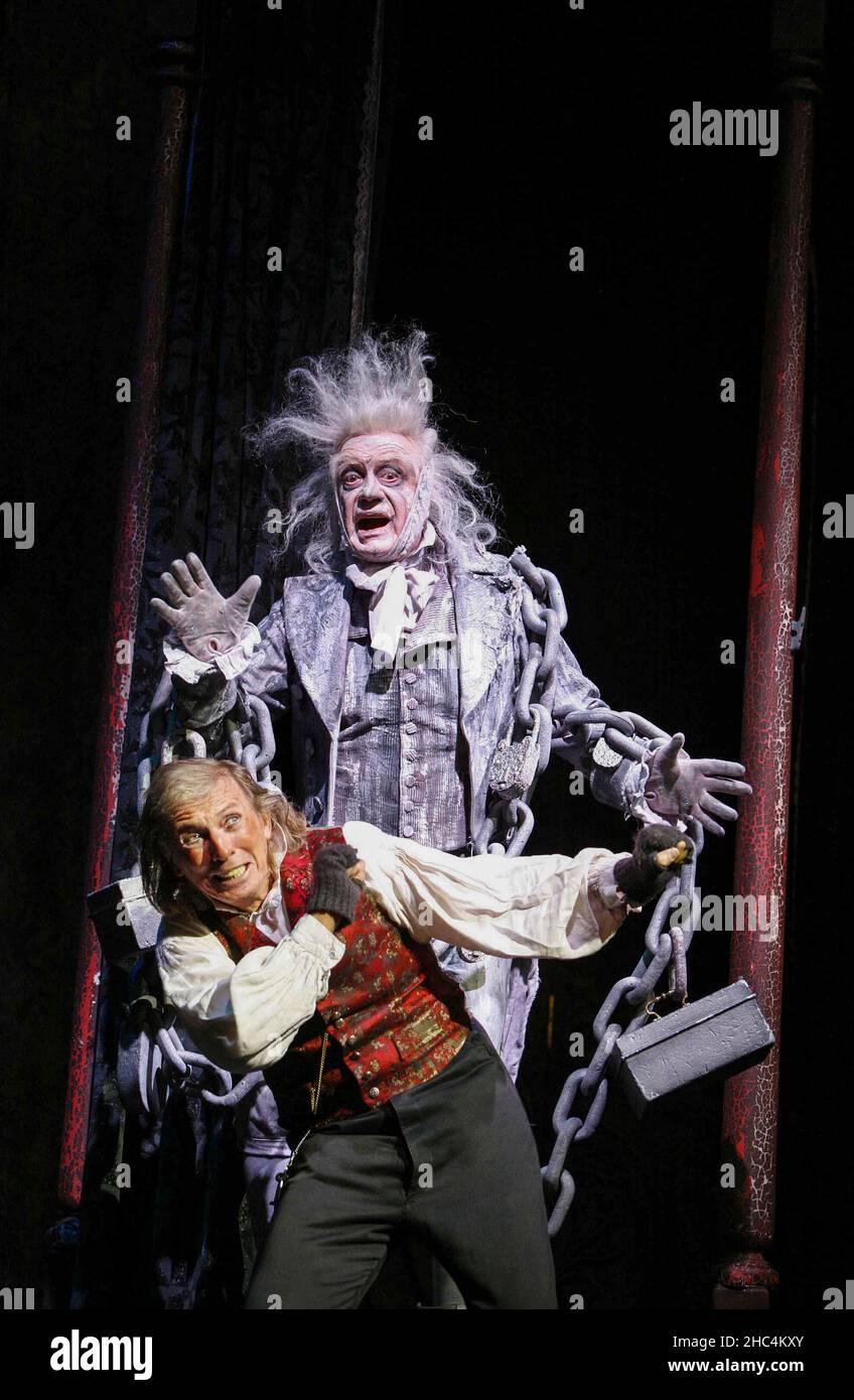 l-r: Tommy Steele (Ebenezer Scrooge, Barry Howard (Jacob Marley) in ...