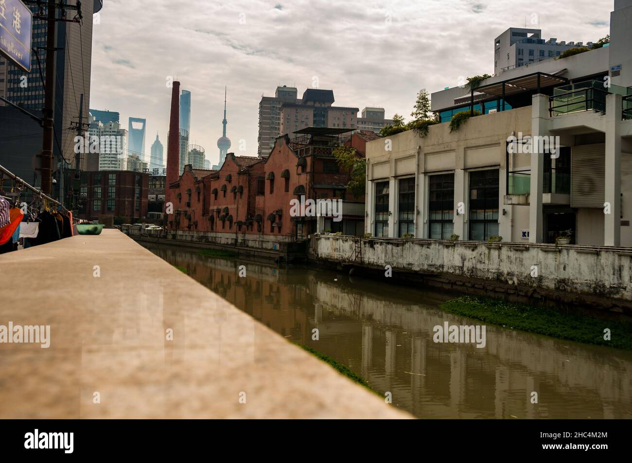 Reflection of the Pudong skyline in Hongkou Gang near 1933 in Hongkou ...