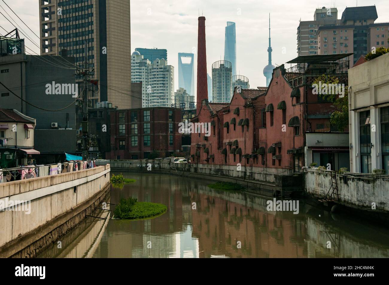 Reflection of the Pudong skyline in Hongkou Gang near 1933 in Hongkou ...