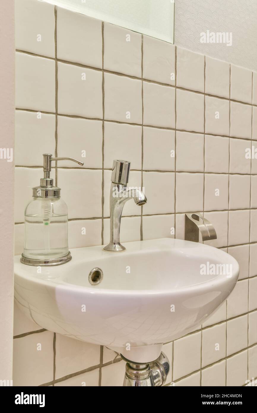 Sink with tap in contemporary restroom at home Stock Photo - Alamy