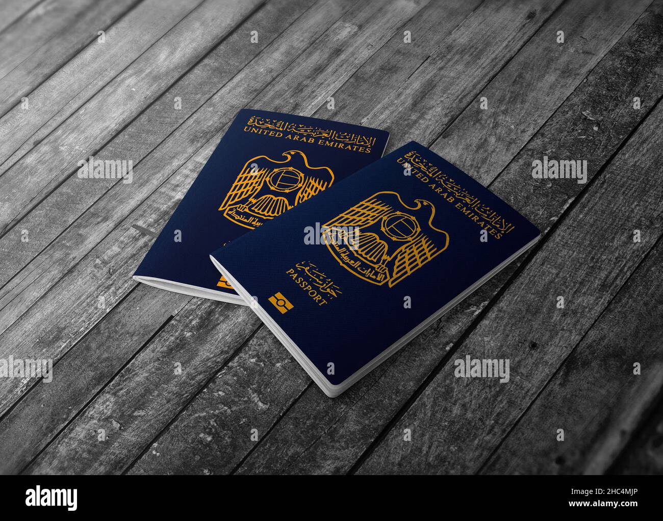 Passports of Arab Emirates ,uae passports on the top of an wood ...