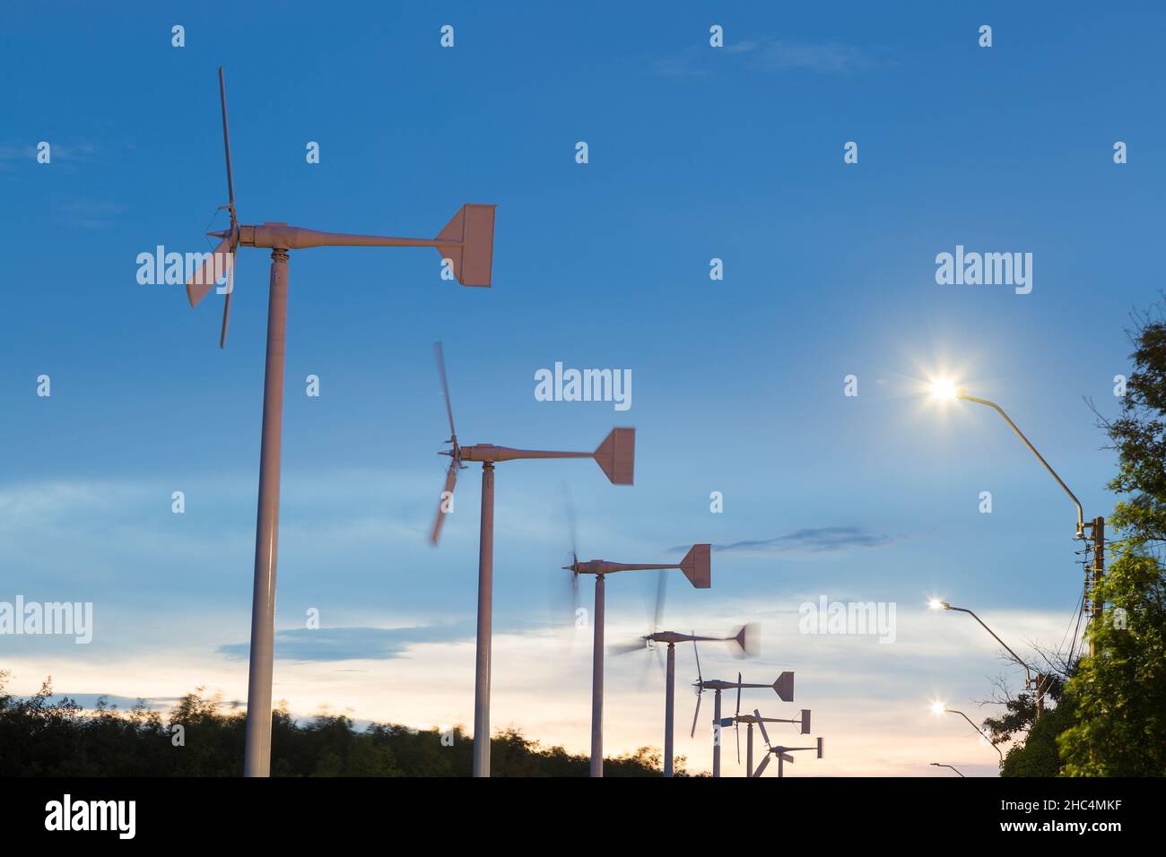 Wind turbines generate electricity. Wind energy produced by wind power ...