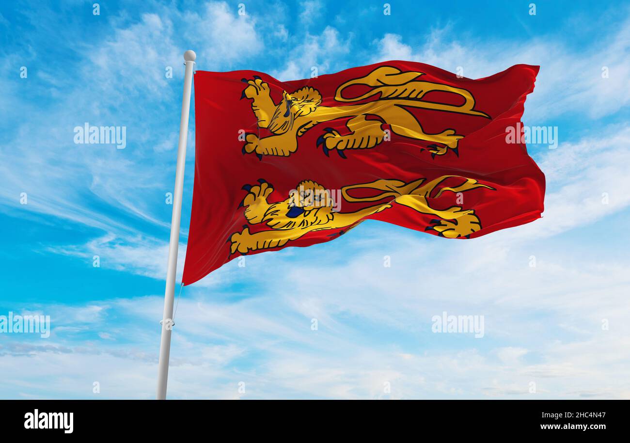 flag of department of Normandie, France at cloudy sky background on ...