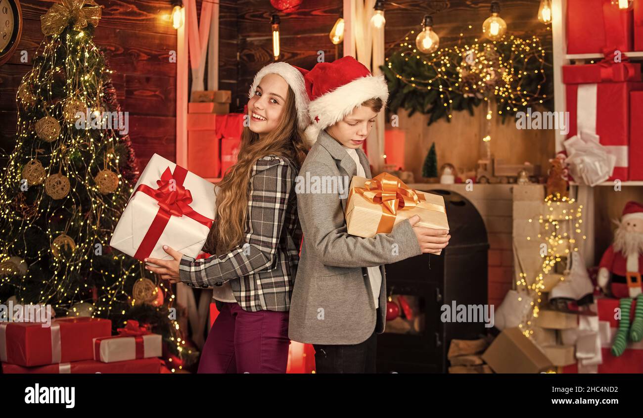 cheerful children have gifts. happy new year. christmas party at home ...