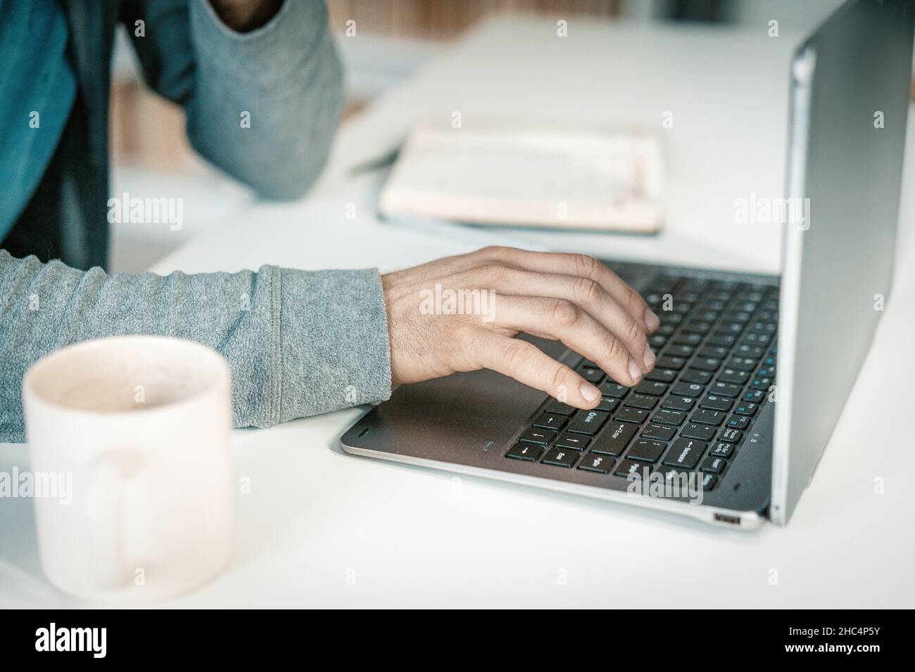 Office Worker Typing on the Laptop Keyboard in his office, Man Working ...