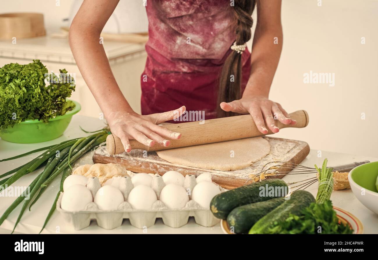 girl having fun while cooking, childhood Stock Photo - Alamy