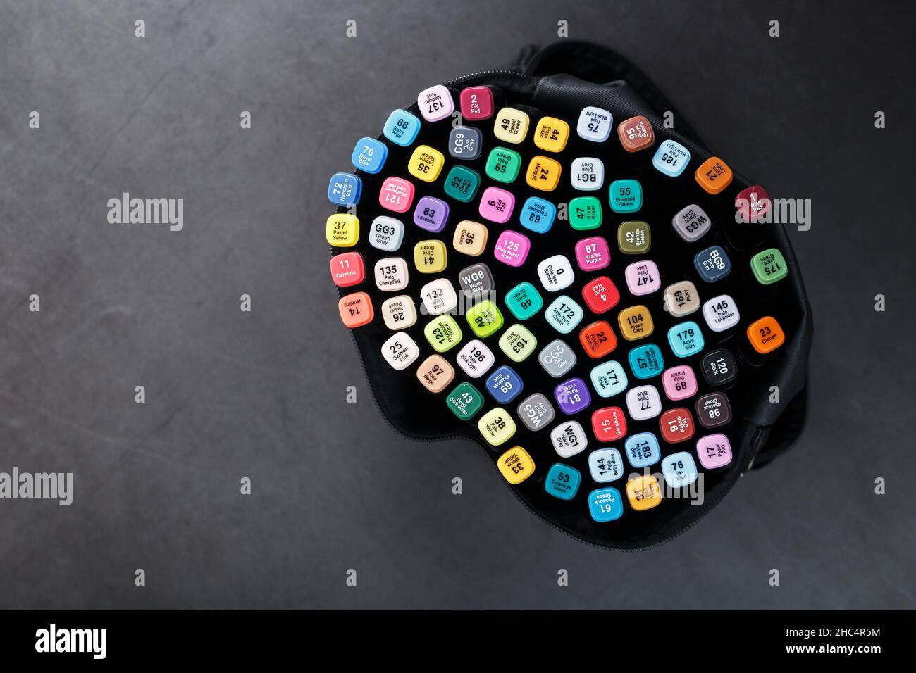 Professional sketching markers of different colors in a bag on a dark ...