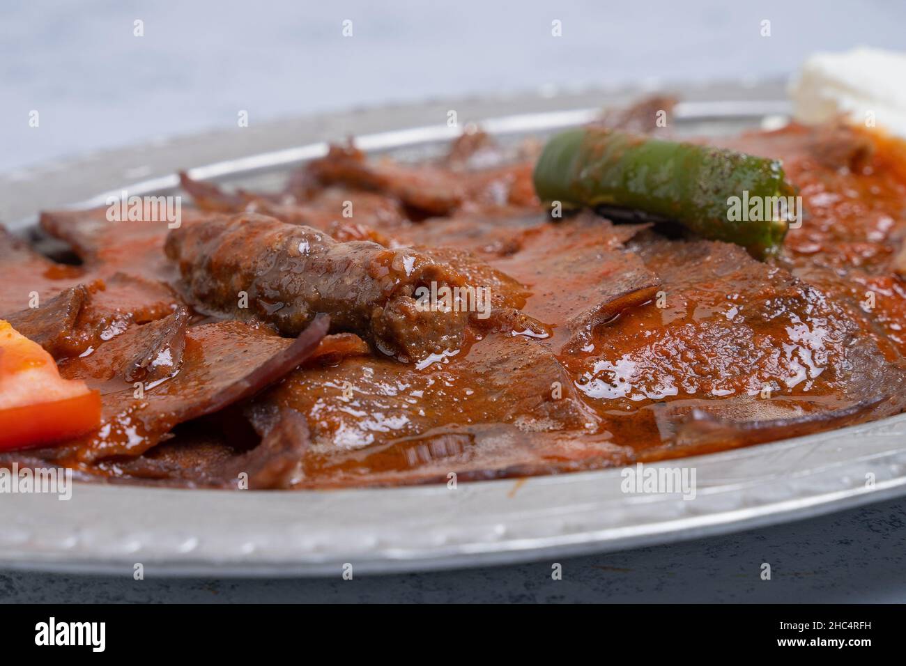 Traditional Turkish cuisine İskender for meal with meat pieces and some ...