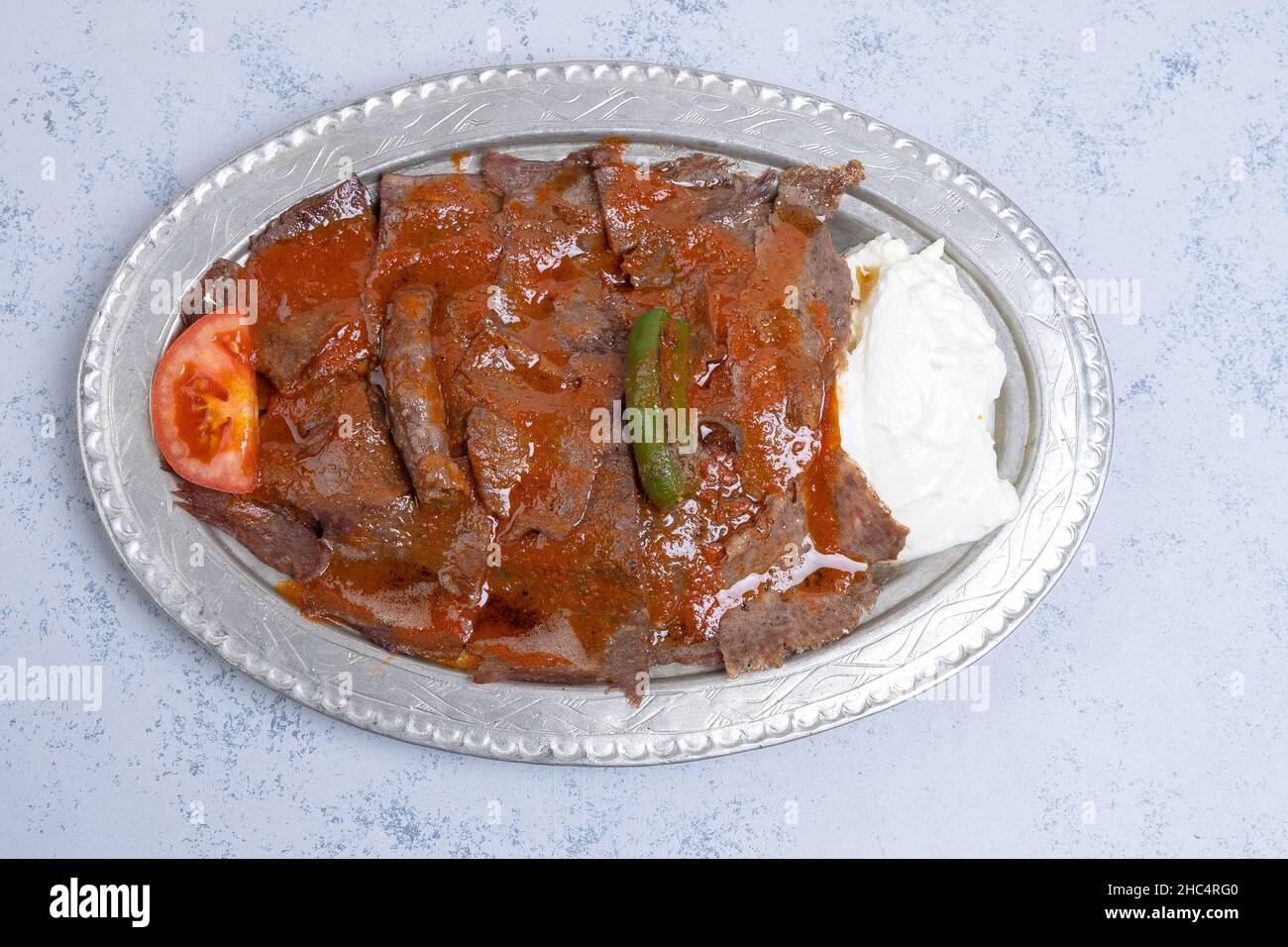 Traditional Turkish cuisine İskender for meal with meat pieces and some ...