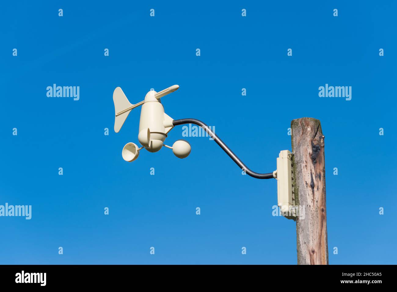 small wind turbine against a blue sky Stock Photo - Alamy