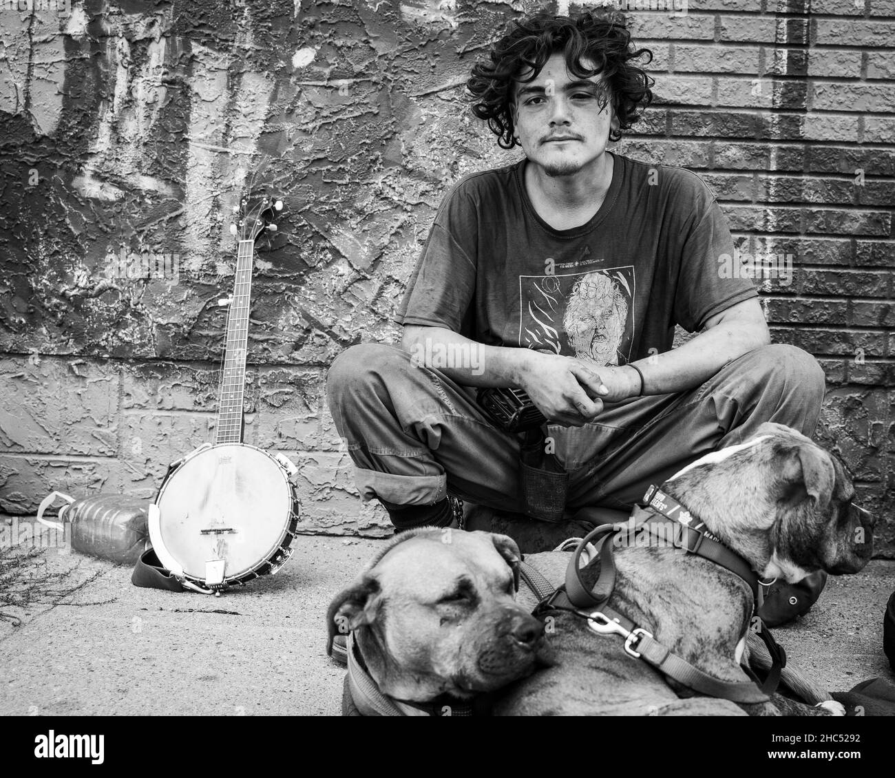 Homeless man with dog hi-res stock photography and images - Alamy