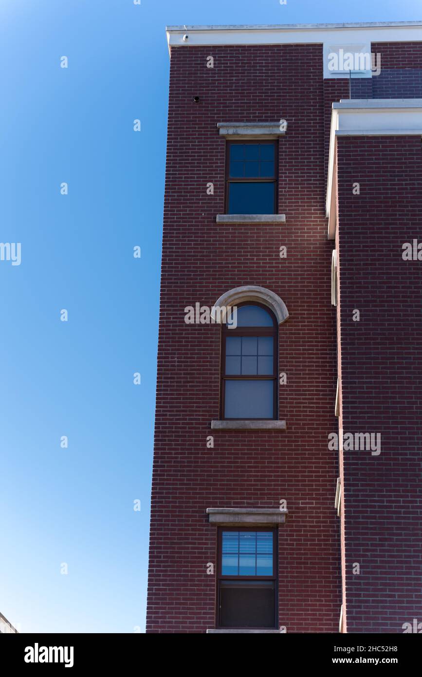 Vertical shot of a tall brick building Stock Photo - Alamy