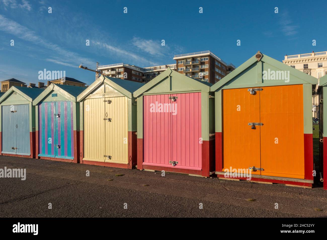 Multi-coloured beach huts on Brighton beach, Brighton, East Sussex, UK ...