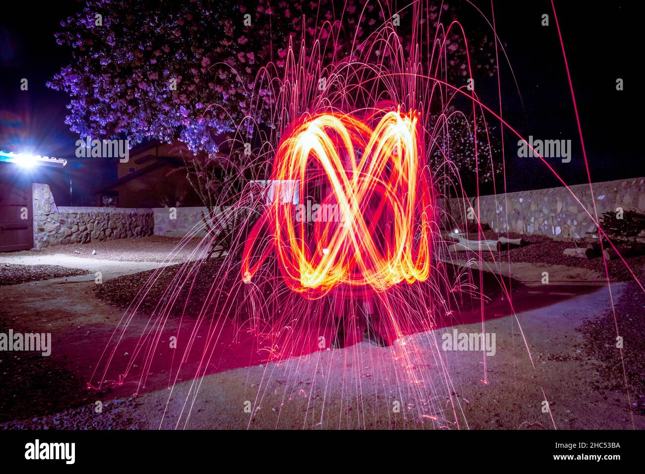Bright lights spinning effect on the street. Light show Stock Photo - Alamy