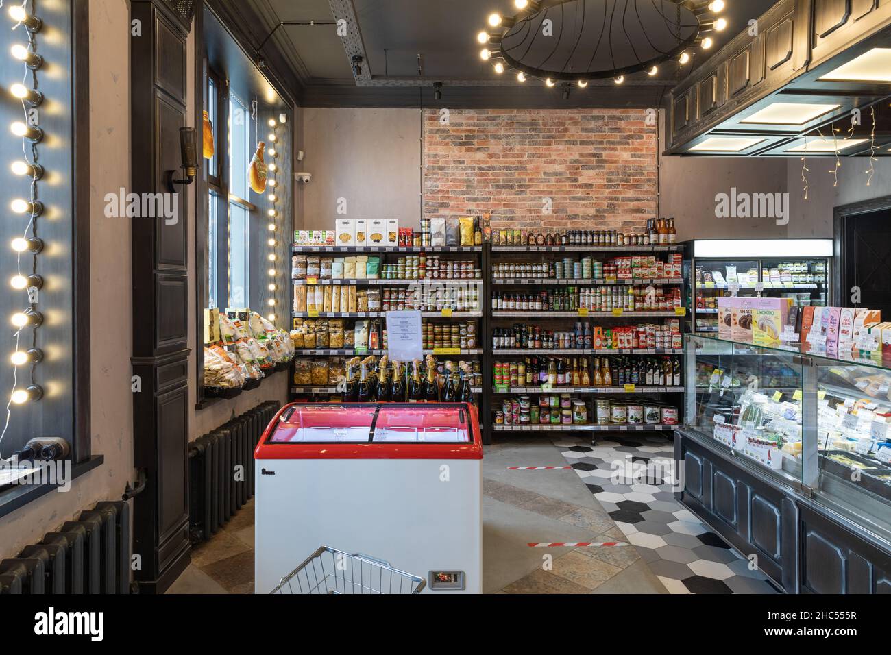 Minsk, Belarus - Dec 20, 2021: interior of a cozy grocery store with a ...