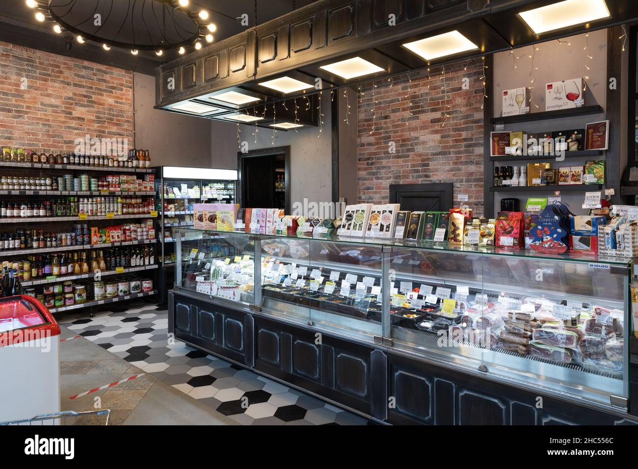 Minsk, Belarus - Dec 20, 2021: interior of a small grocery store with a ...