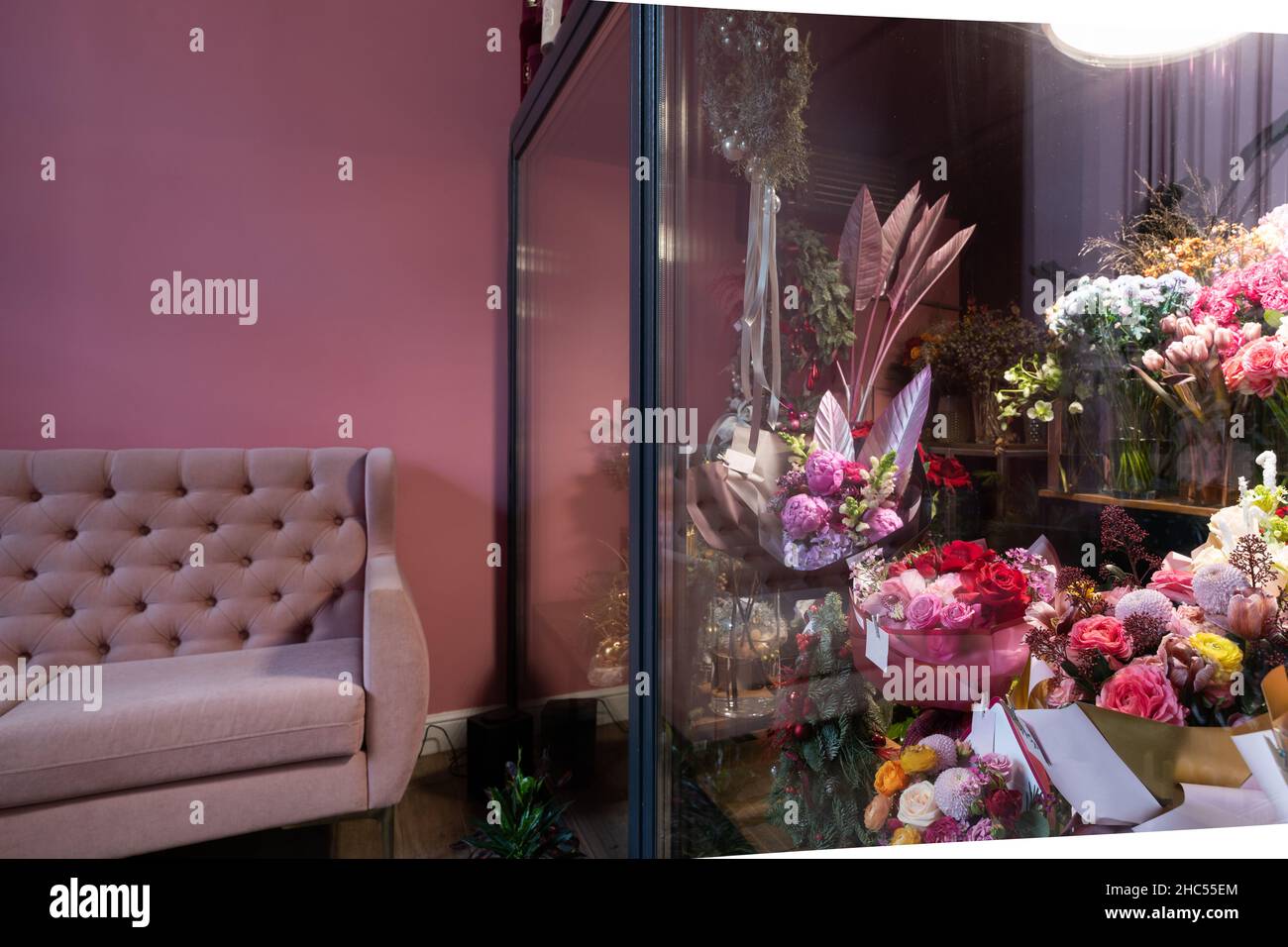 interior of a cozy florist shop selling flowers and bouquets with a ...
