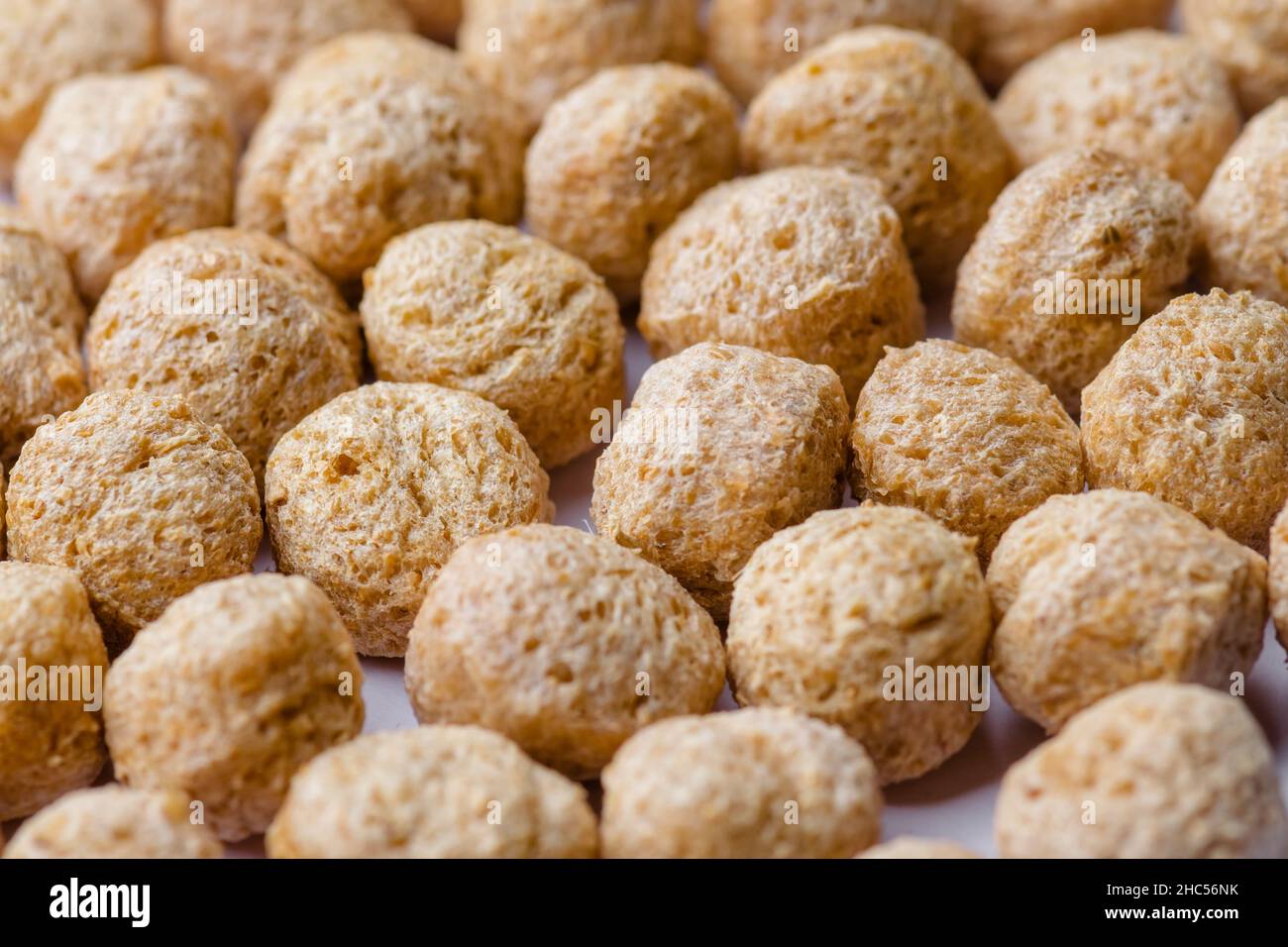 Raw Soya chunks closeup photo. These are the byproducts left after ...