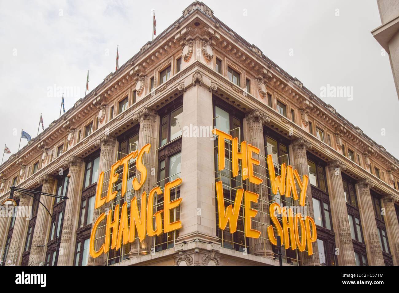 'Let's Change The Way We Shop' sign is seen at Selfridges on Oxford ...