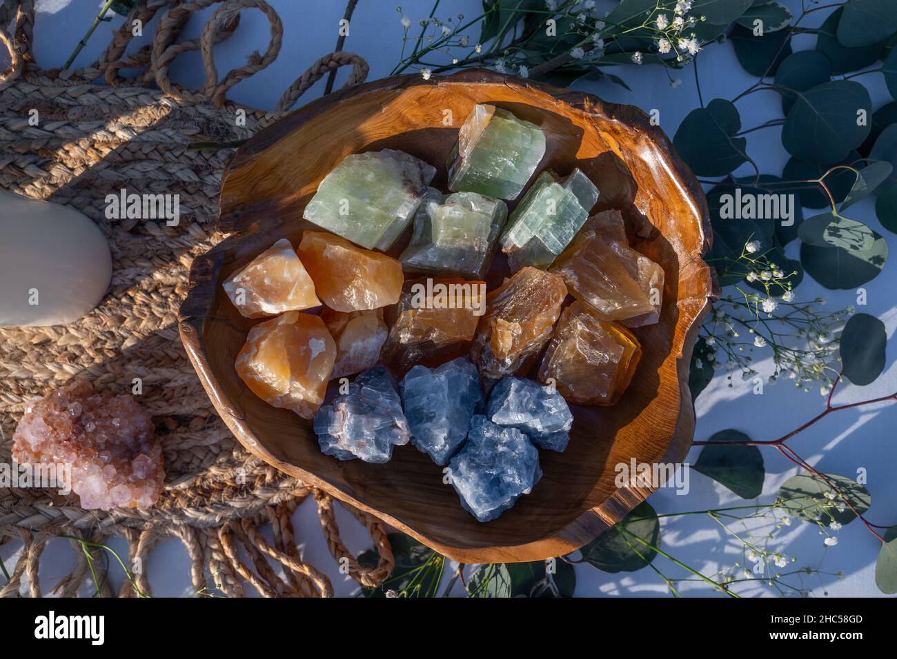 Top view of a tray with various mineral stones prepared for spiritual ...