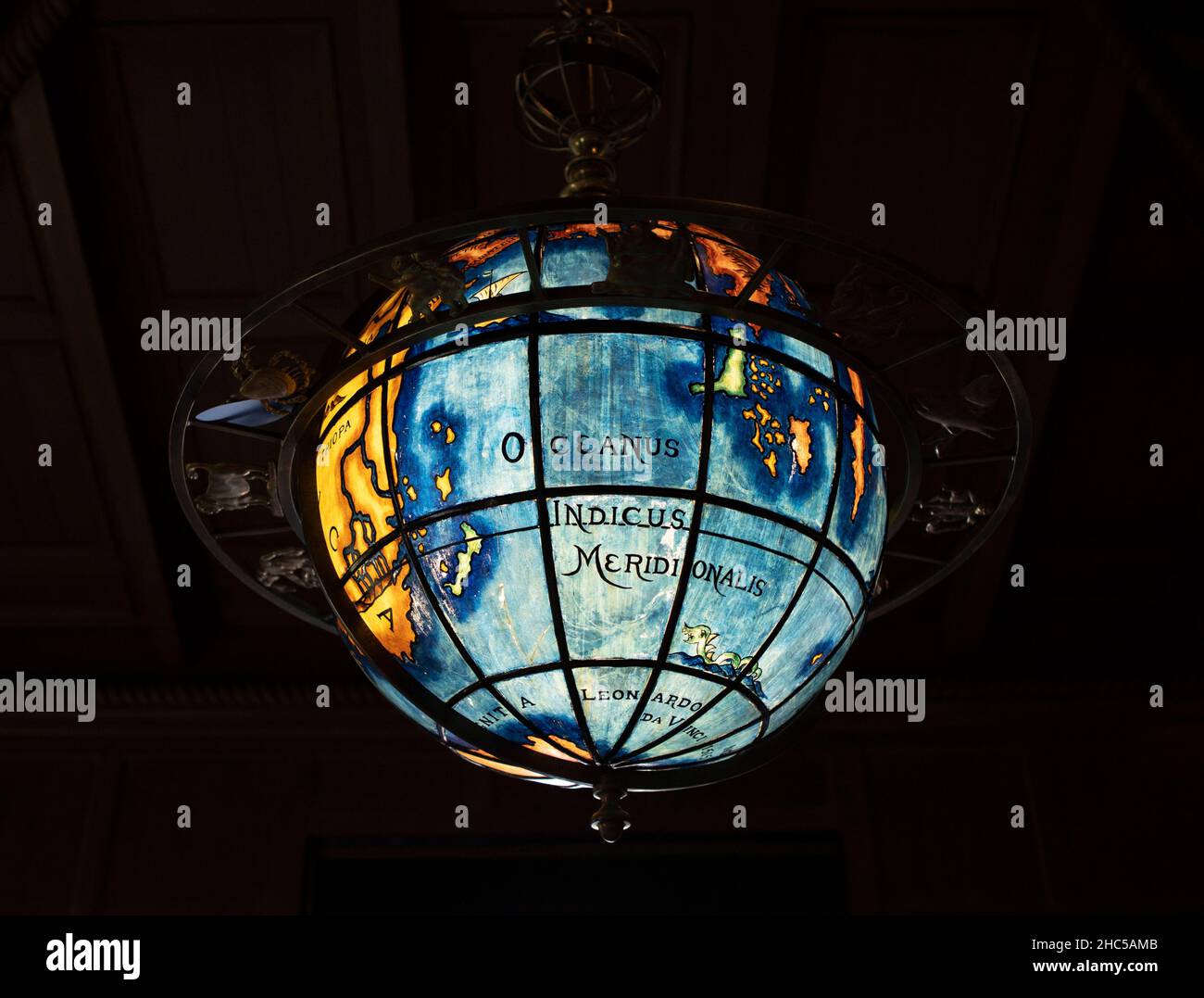 Closeup of a creative globe chandelier in a dark room Stock Photo - Alamy