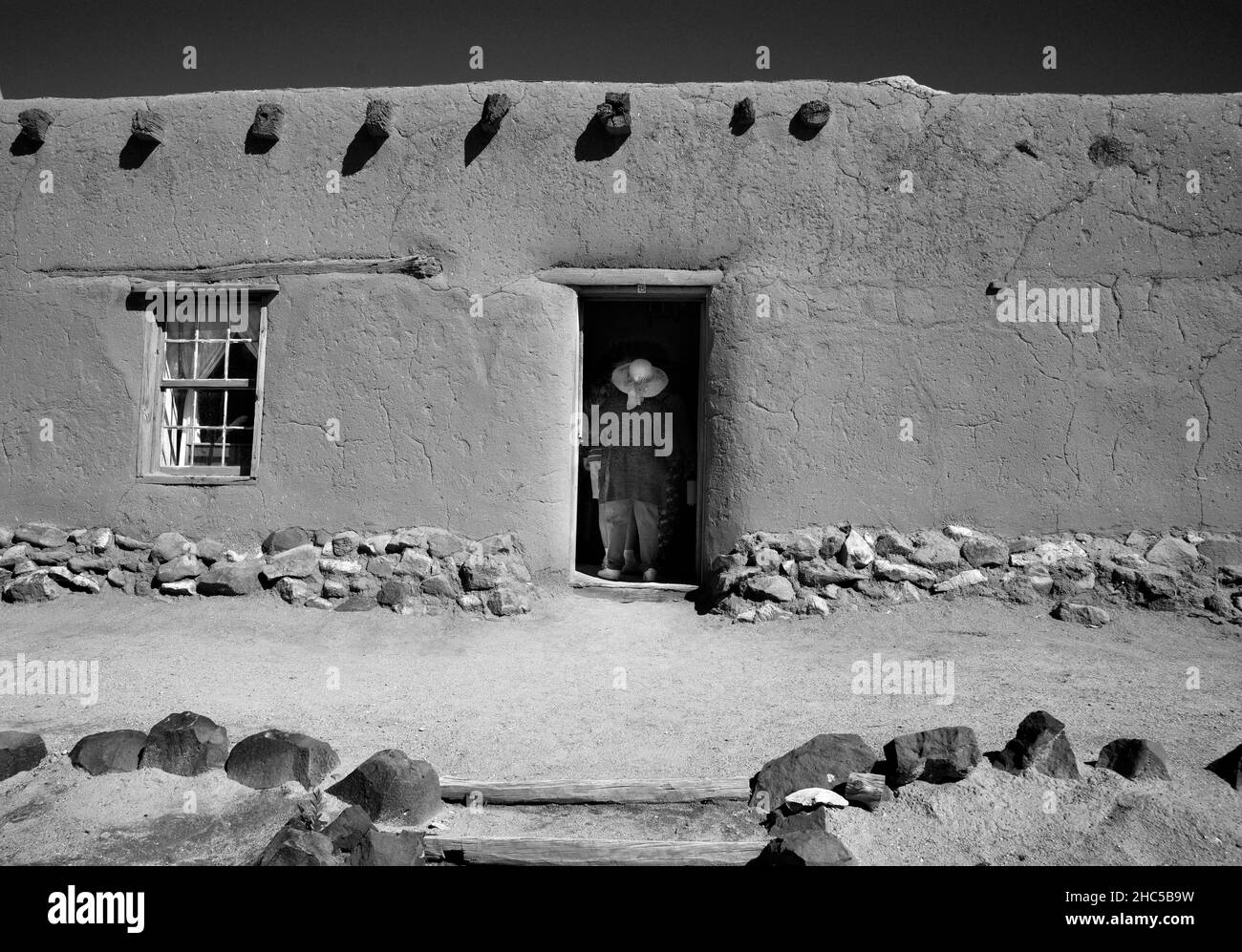Visitors explore the historic 19th century adobe structures at El ...
