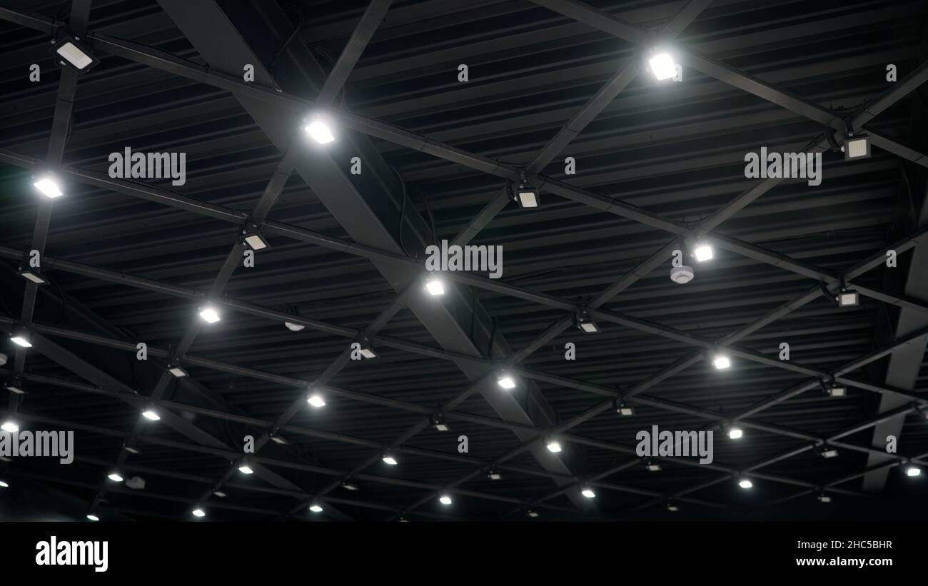 Beautiful ceiling made of fittings and light bulbs. The luminaire is ...