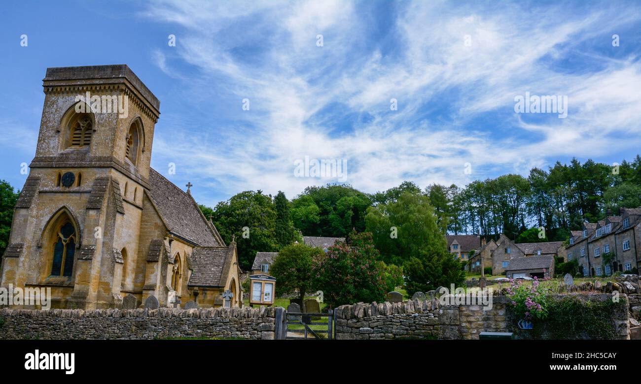 The parish church of St Barnabas in the attractive Cotswold village of ...
