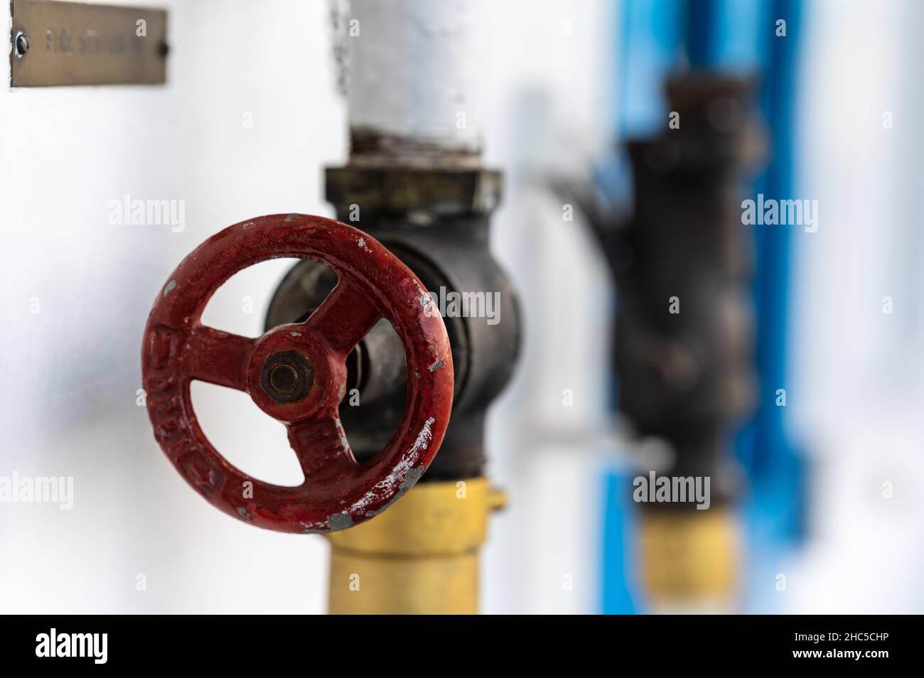 Close up shot of a valve in a ship Stock Photo - Alamy