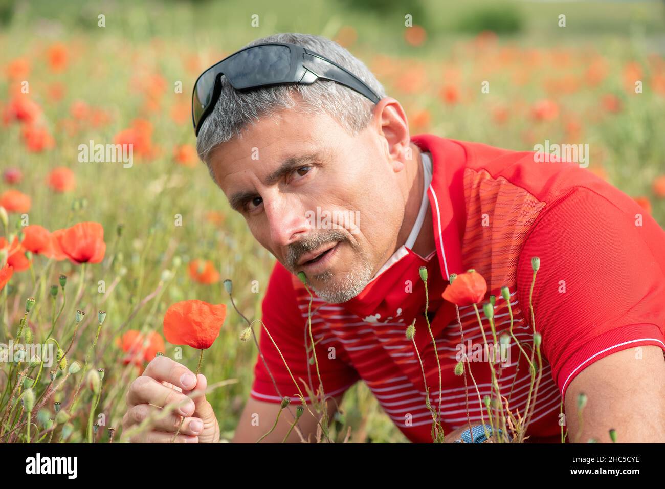 Man sniffing hi-res stock photography and images - Alamy