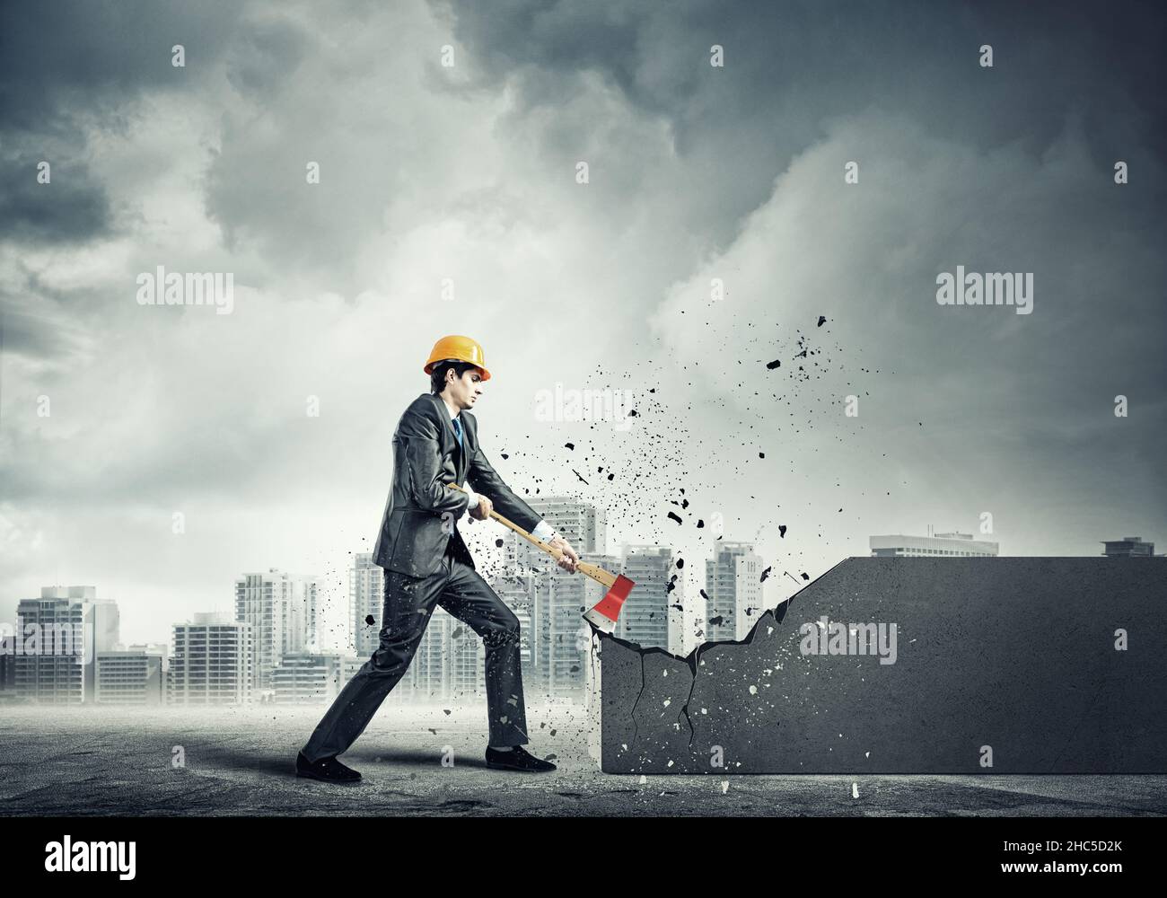 Engineer man break wall Stock Photo - Alamy