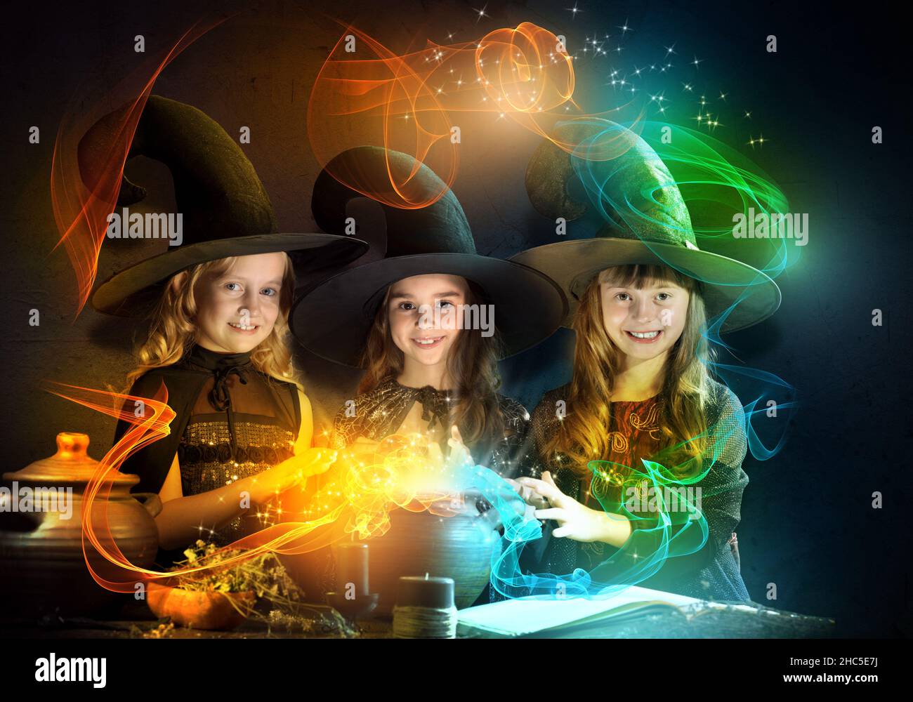 Three little witches Stock Photo - Alamy