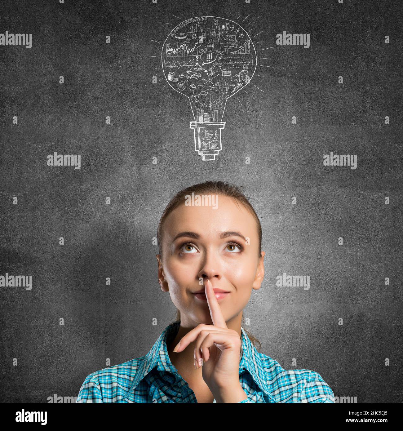 Girl showing hush gesture Stock Photo - Alamy