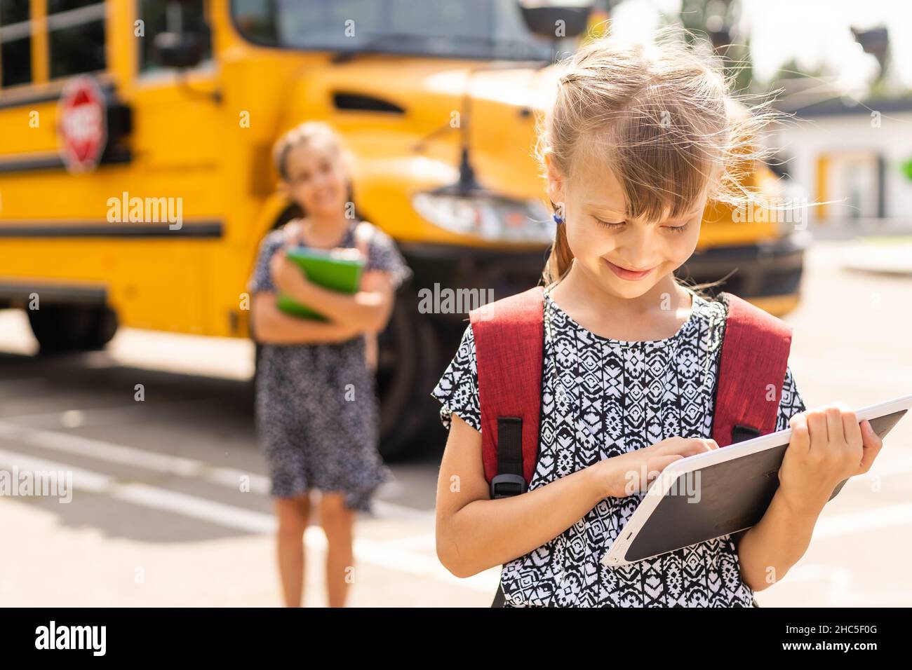 Child running school bus hi-res stock photography and images - Alamy