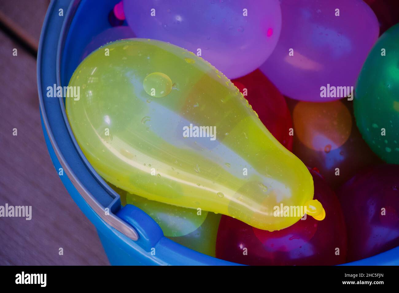 Closeup of the colorful balloons filled with water Stock Photo - Alamy