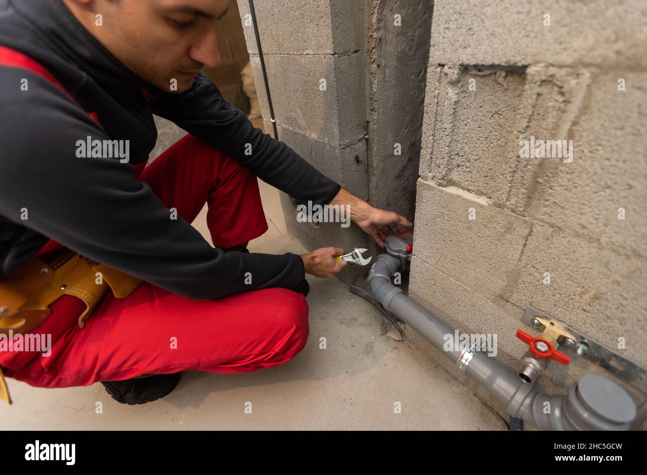 Builder handyman with construction tools. House renovation background ...