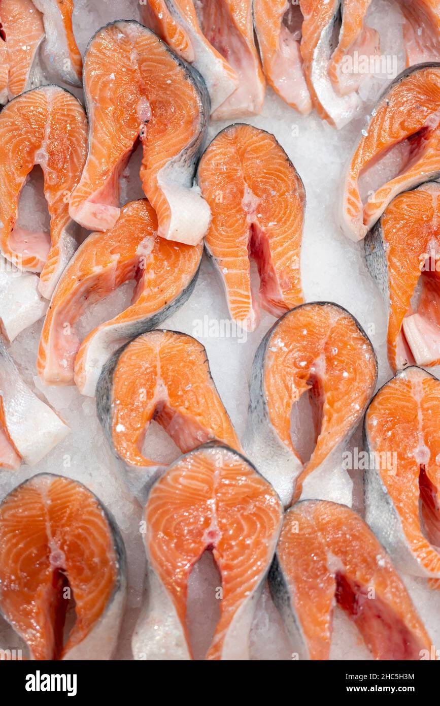 Salmon steaks are sold in the store. Sale of seafood Stock Photo - Alamy
