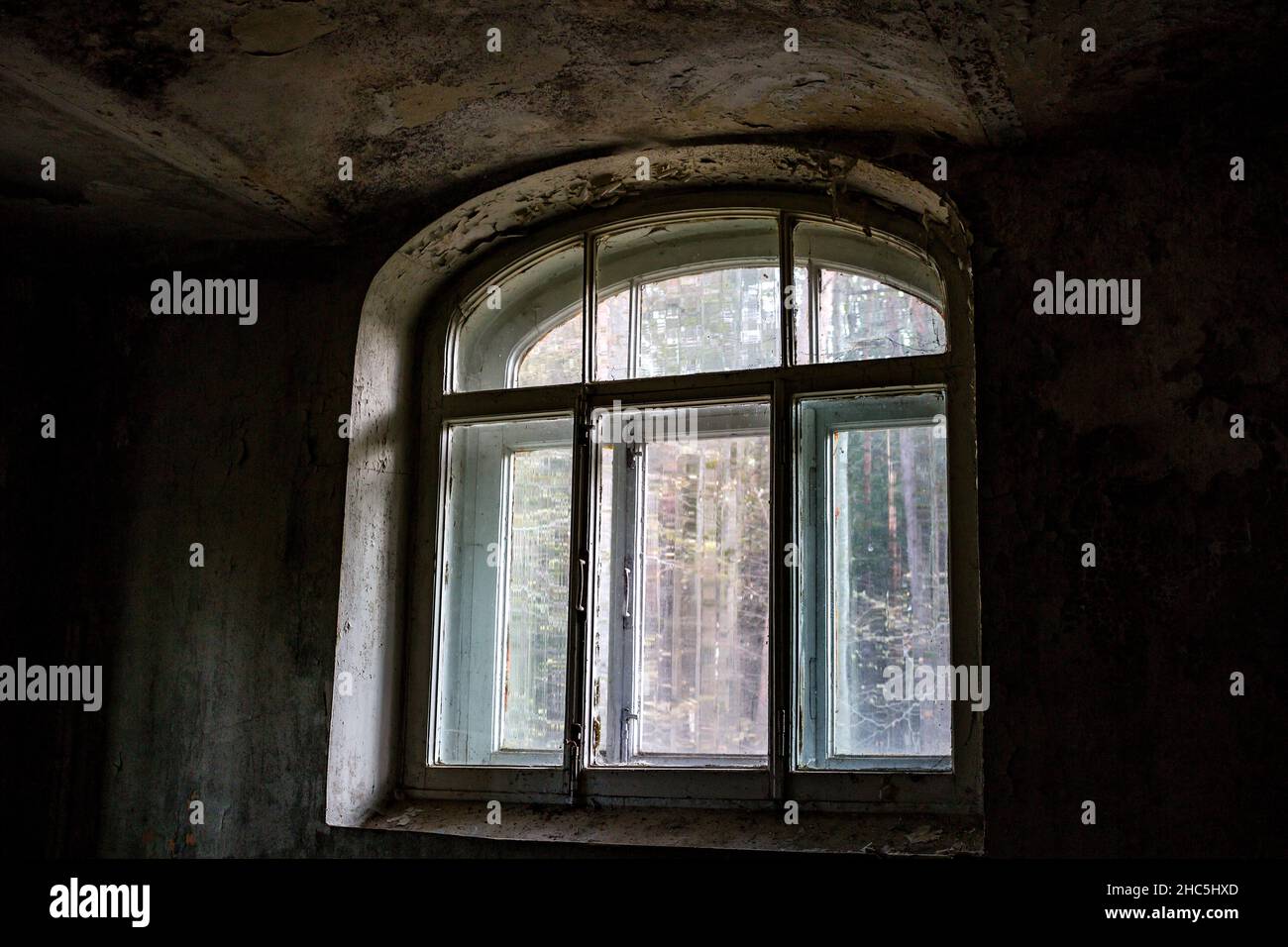 A semicircular arch window in an old abandoned building Stock Photo - Alamy