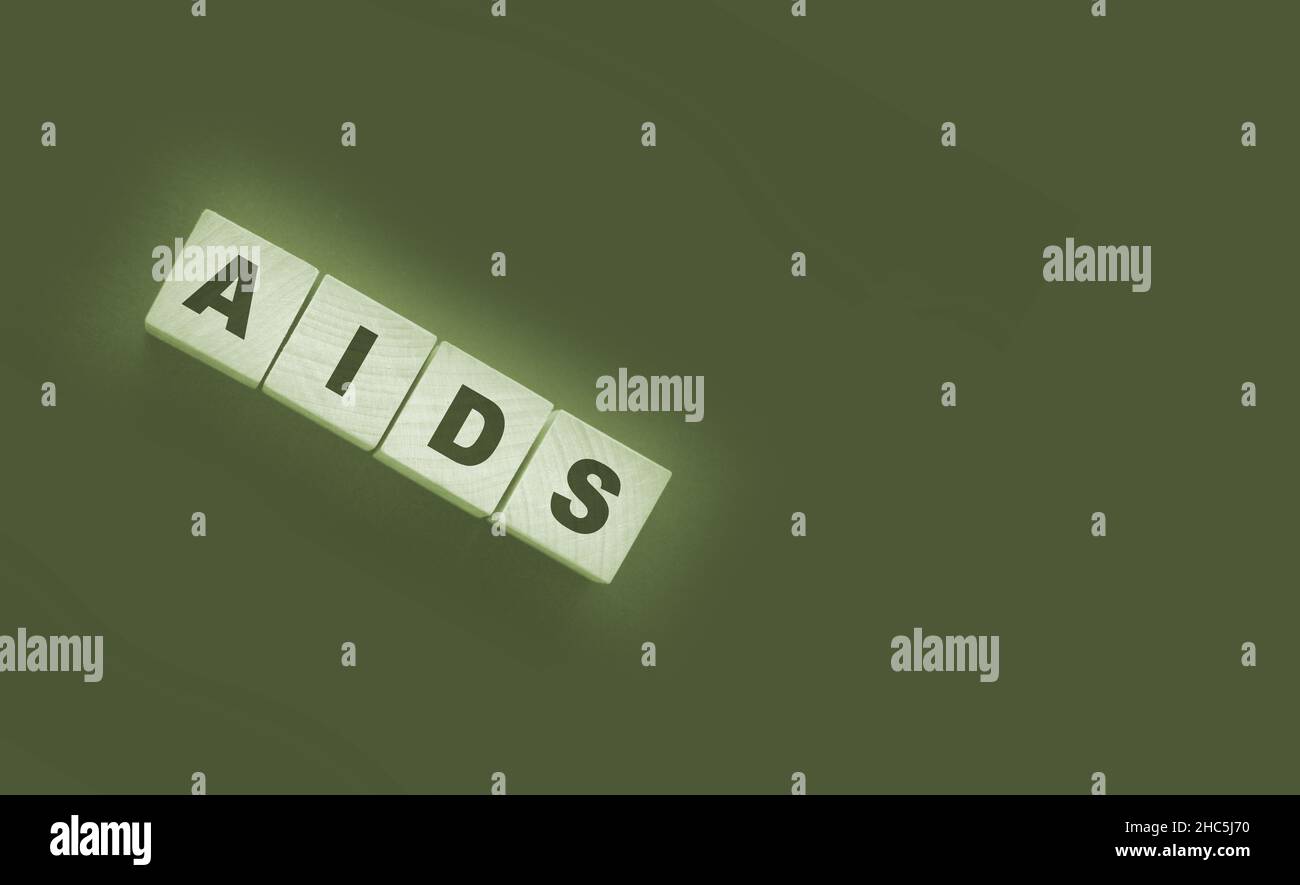 AIDS abbreviation written on wooden cubes. Healthcare concept. STD ...