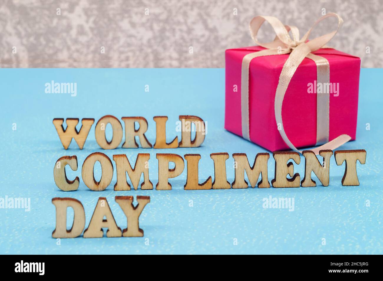International Compliment Day. Banner with wooden letters. Holiday ...
