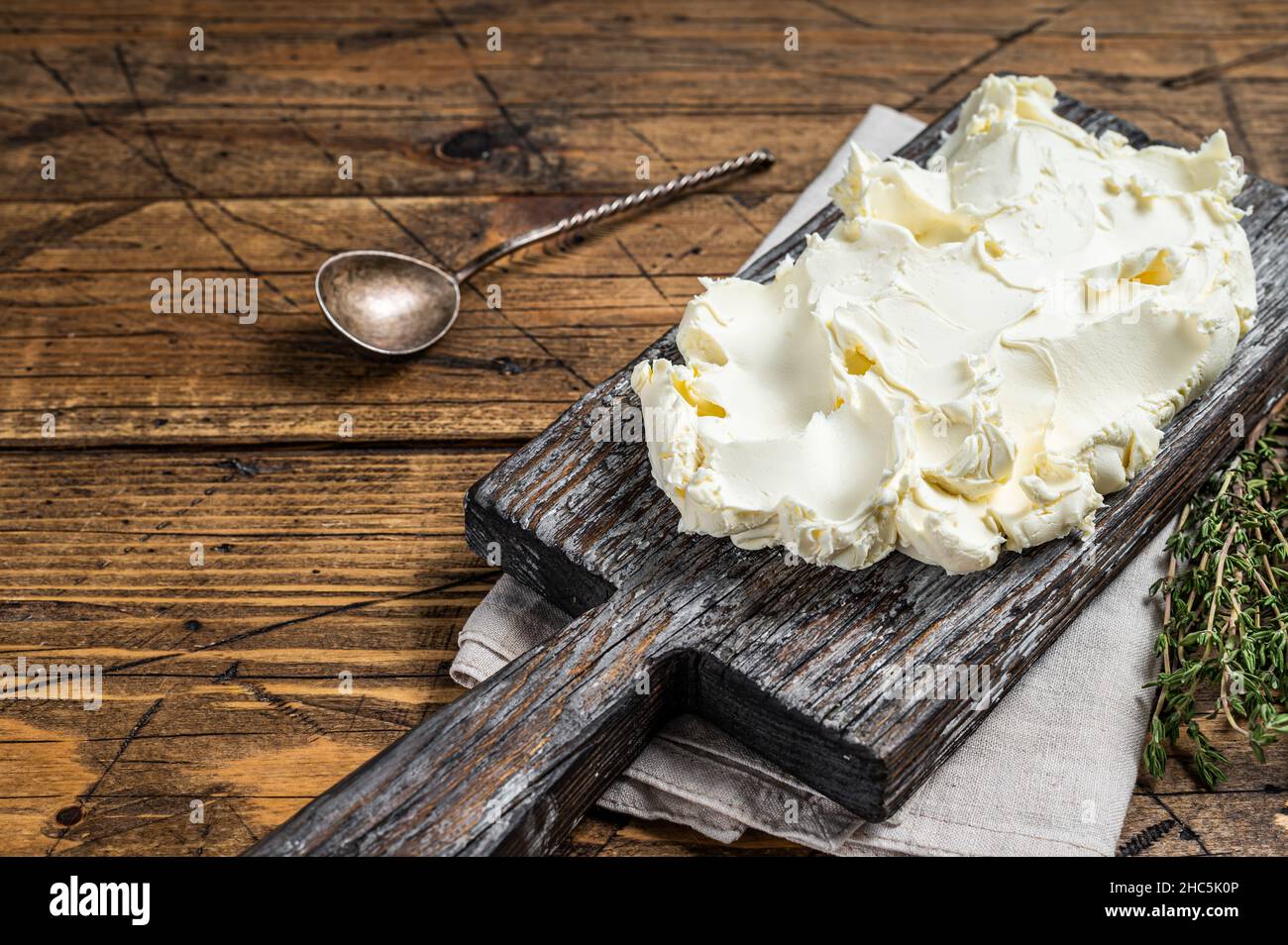 Mascarpone italian Cream cheese. Wooden background. Top view. Copy ...