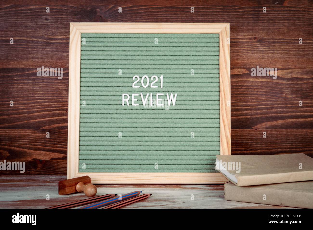 2021 REVIEW. English text on a letter Board Stock Photo - Alamy